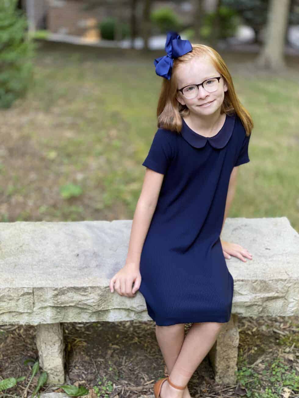 Girls knit dress sewing pattern by Love Notions.